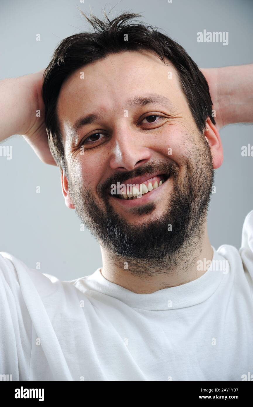 Portrait young man mischievous look hi-res stock photography and images ...