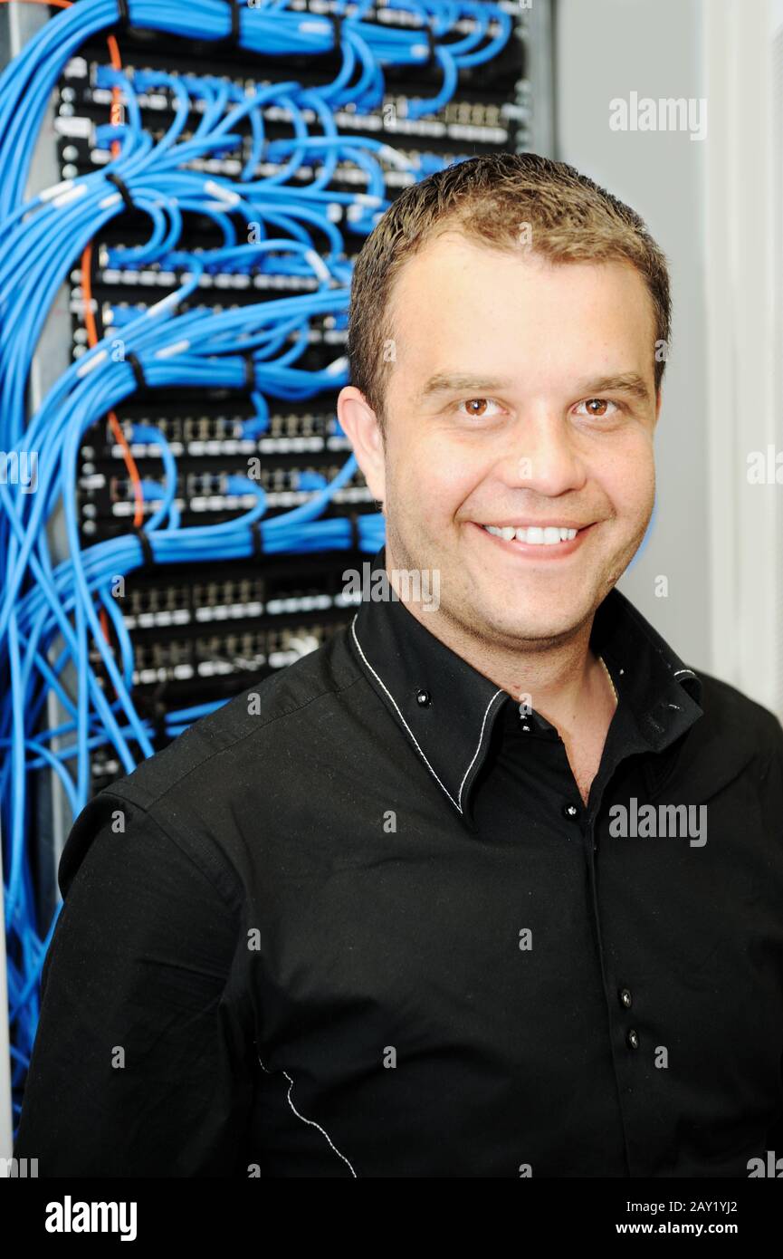 Administrator at server room Stock Photo - Alamy