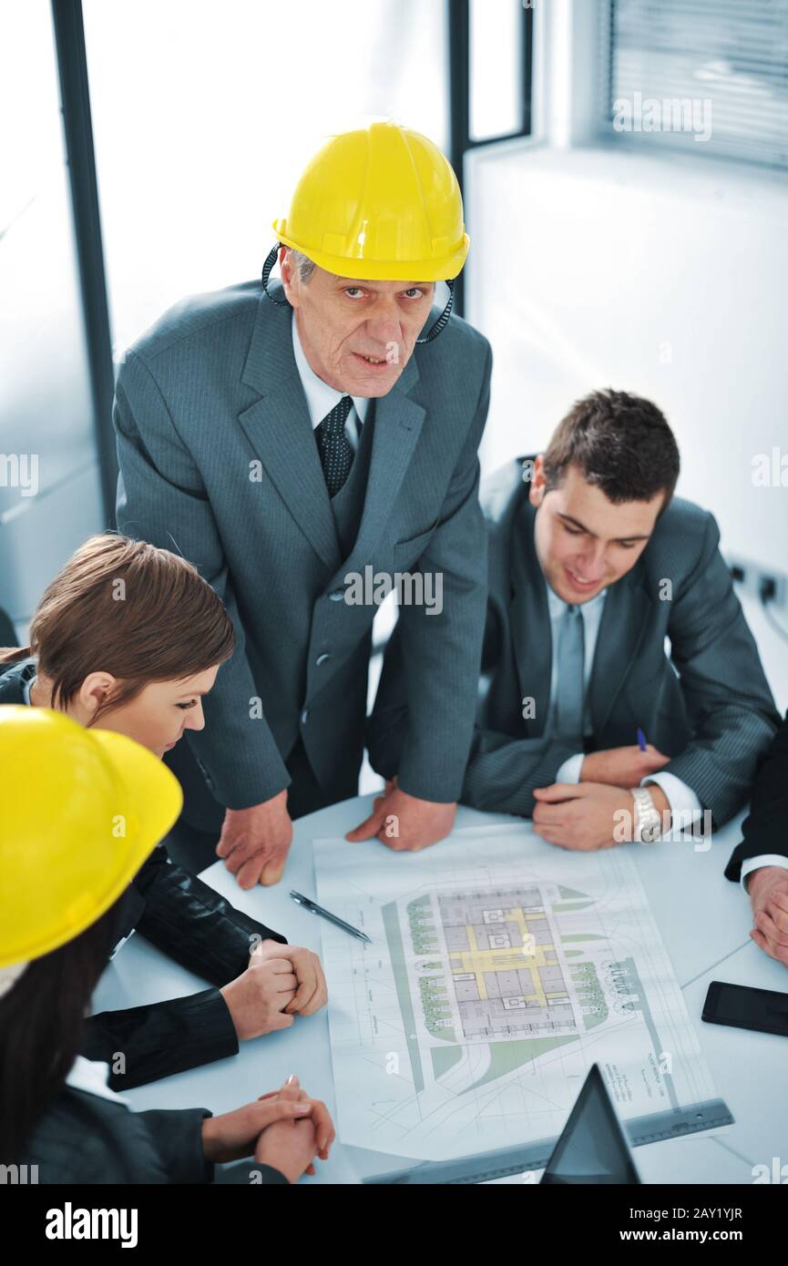 Boss and his colleagues Stock Photo - Alamy
