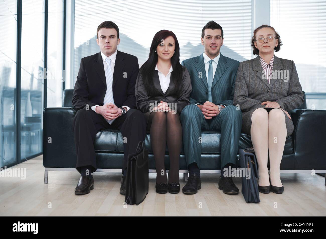 Group of women sitting on sofa hi-res stock photography and images - Alamy