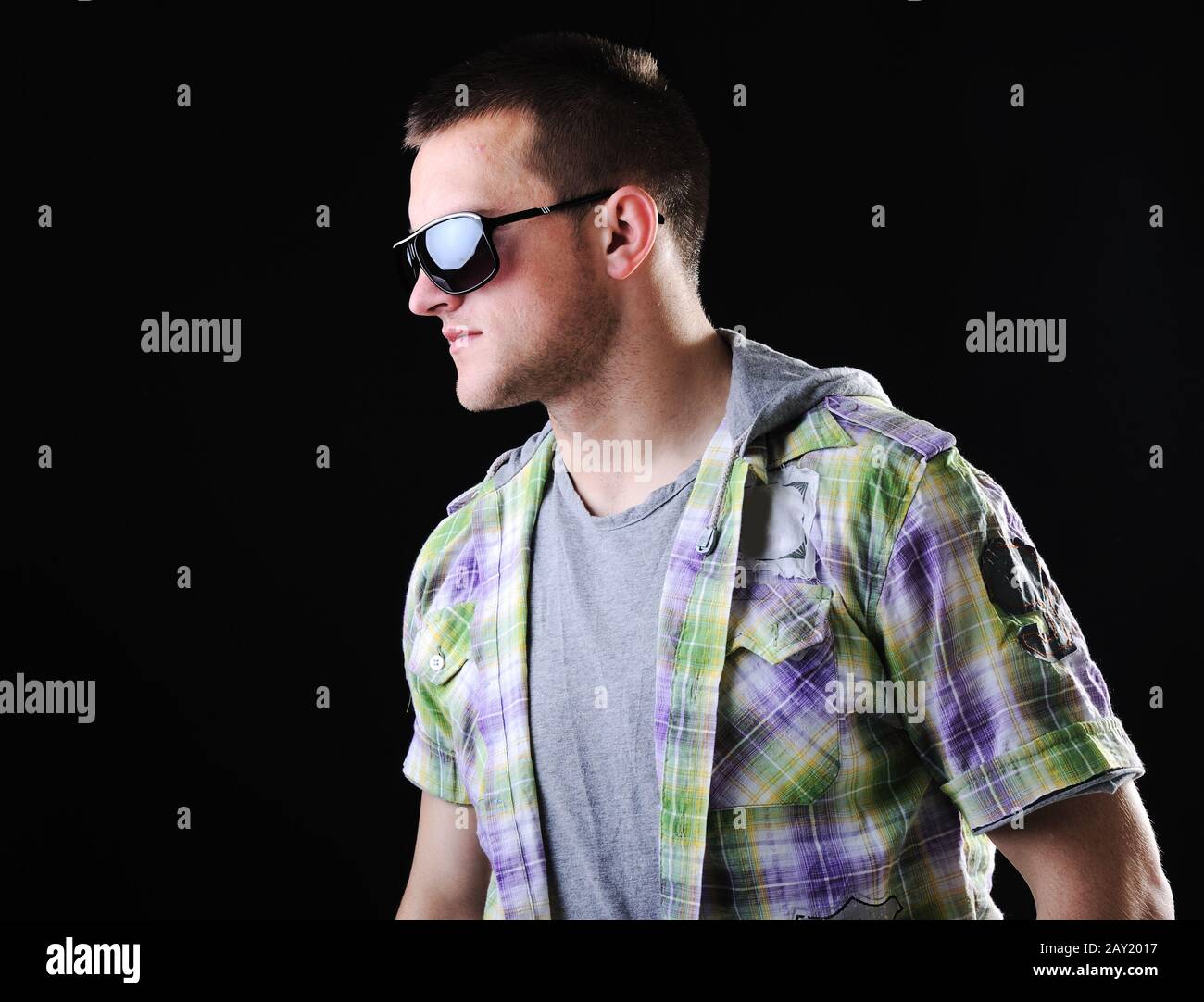 Young macho man in different poses Stock Photo - Alamy