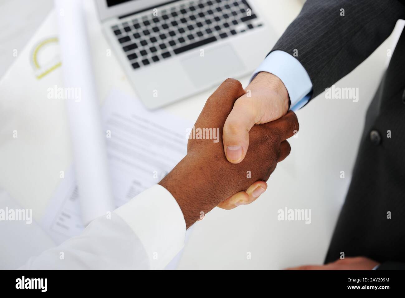 Successful work partner handshake showing hi-res stock photography and ...