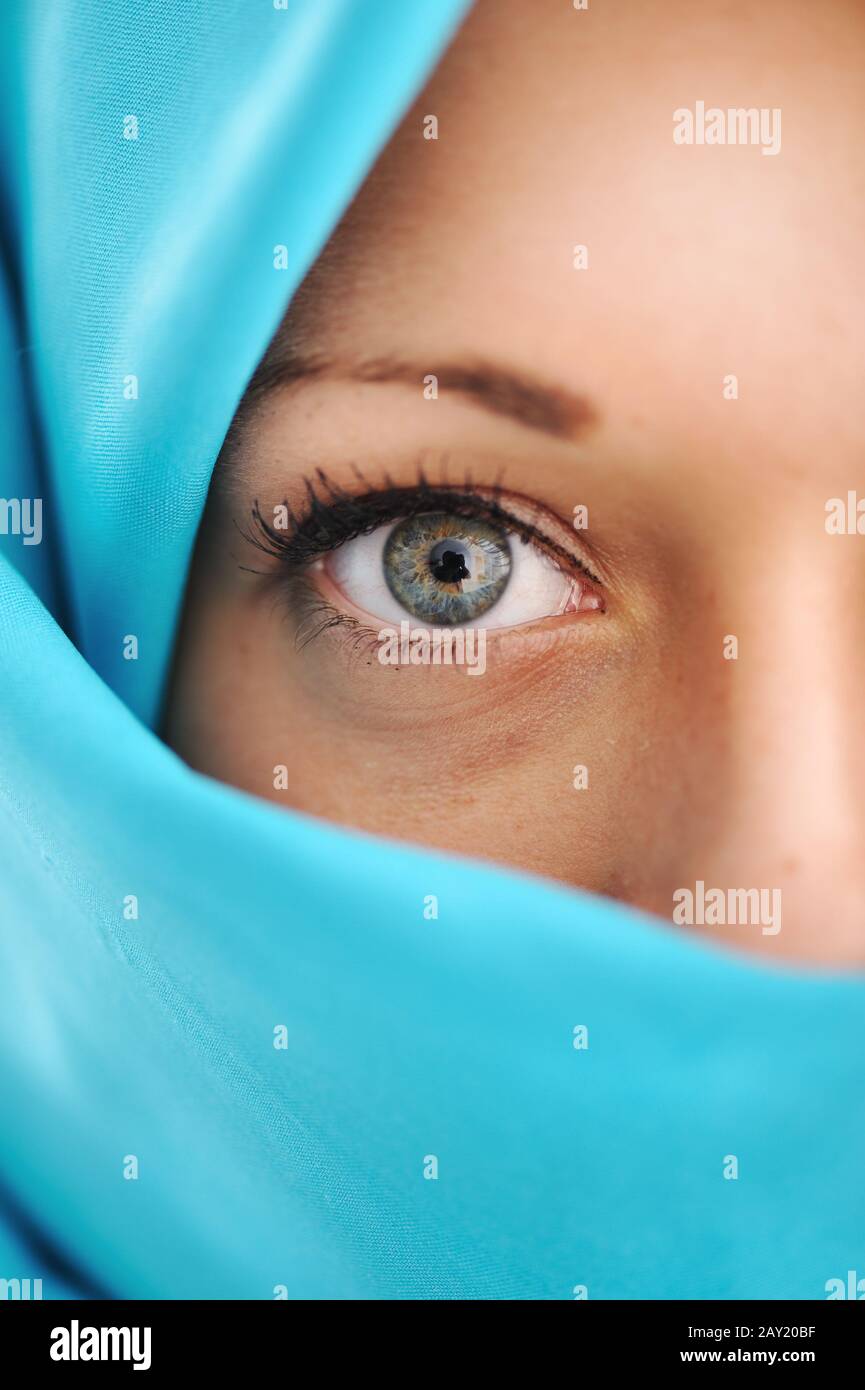Half face in blue scarf Stock Photo - Alamy