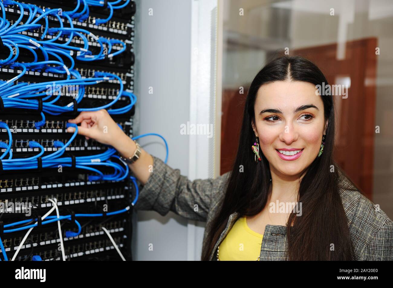Female administrator at server room Stock Photo - Alamy