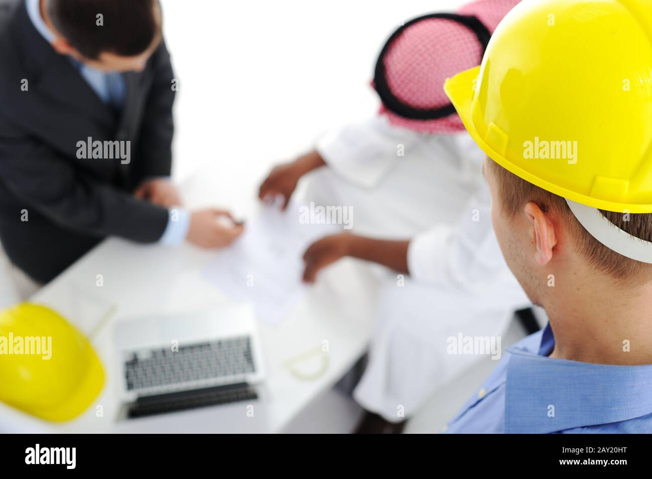 Multicultural group of engineers architects planning for new project ...