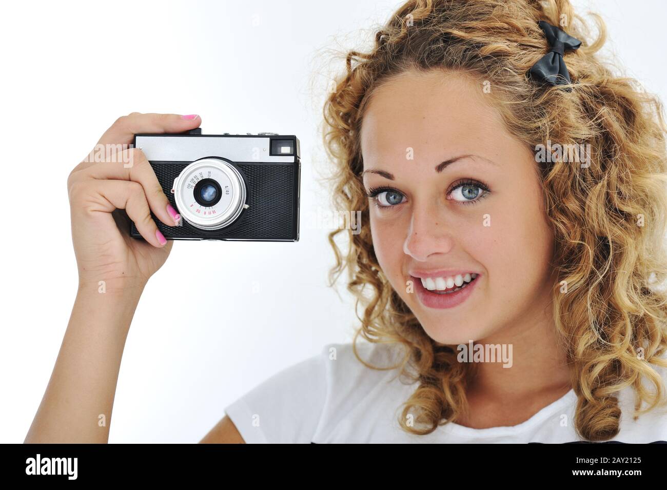 Cute girl with camera isolated Stock Photo - Alamy