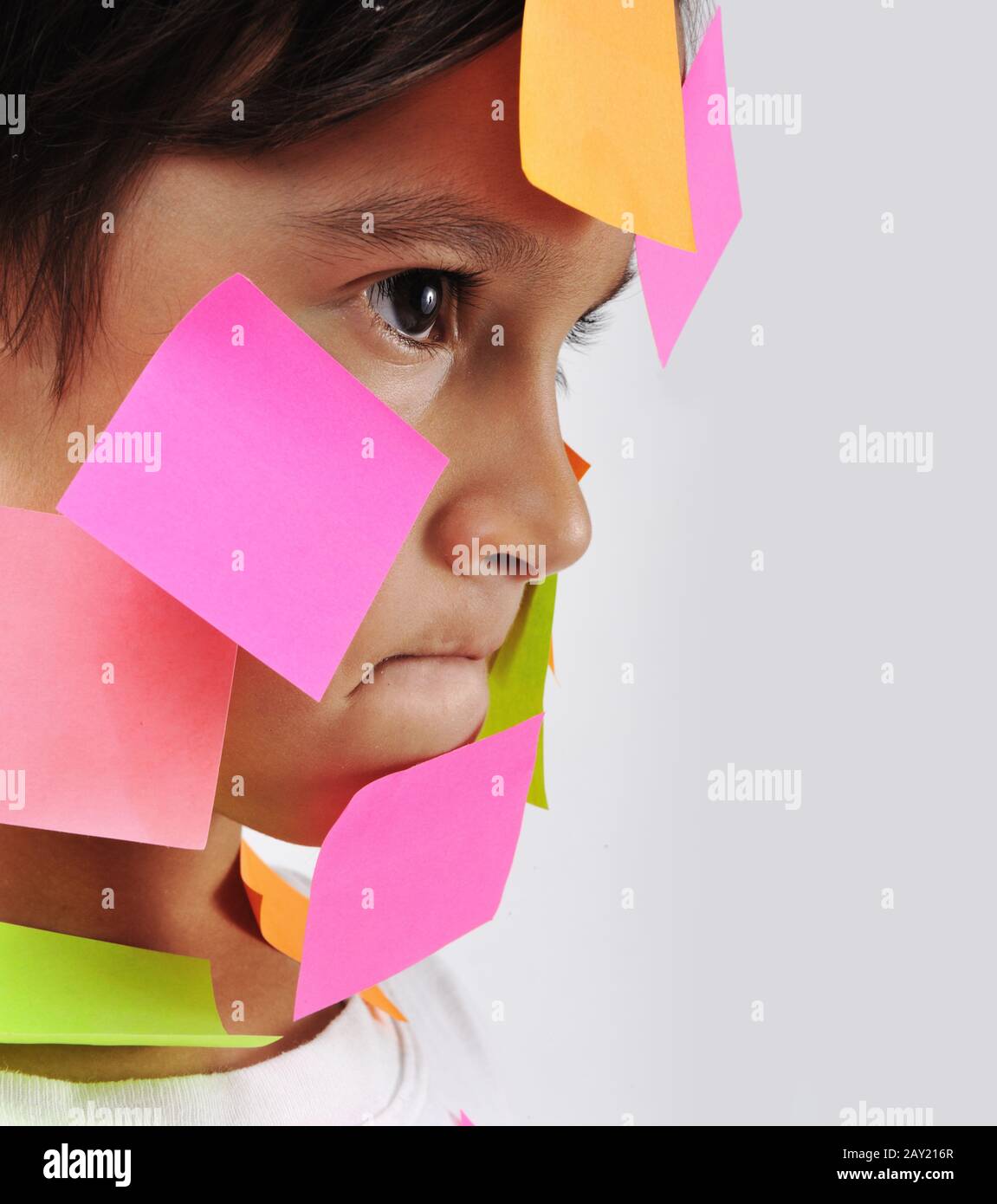 Little boy with memo posts on his face Stock Photo - Alamy