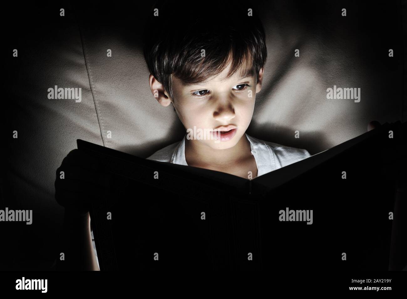 Scared kid reading hi-res stock photography and images - Alamy