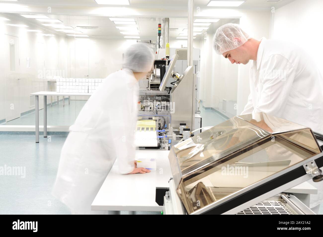 Workers at modern drug factory Stock Photo - Alamy