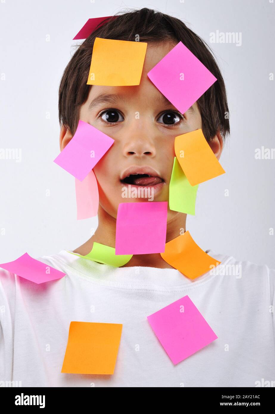Little boy with memo notes on his face Stock Photo - Alamy