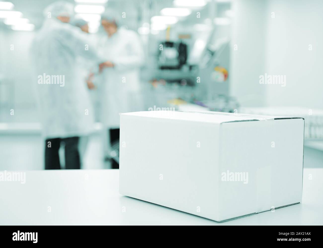 White box at automated production line at modern factory - ready for ...