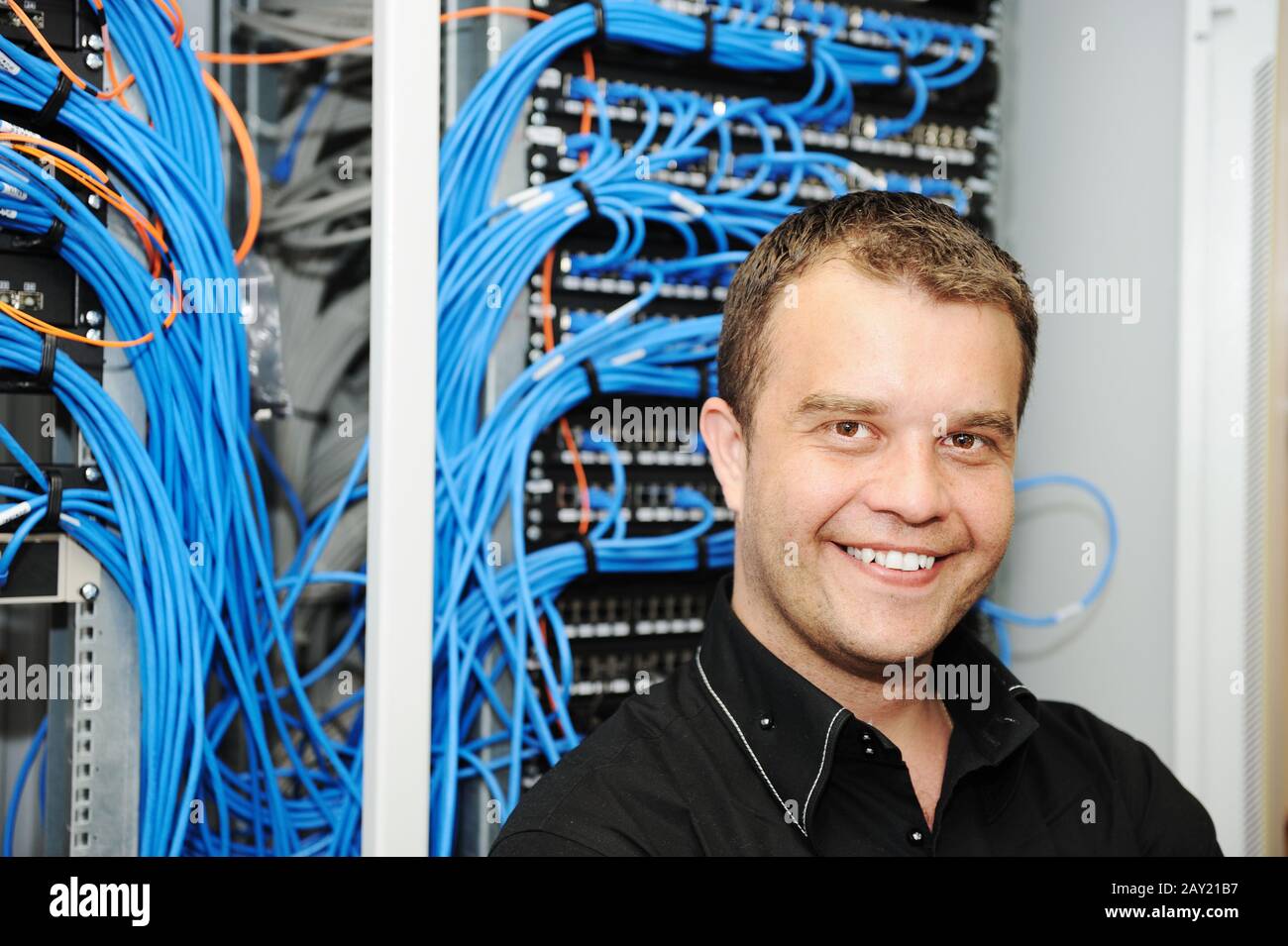Administrator at server room Stock Photo - Alamy