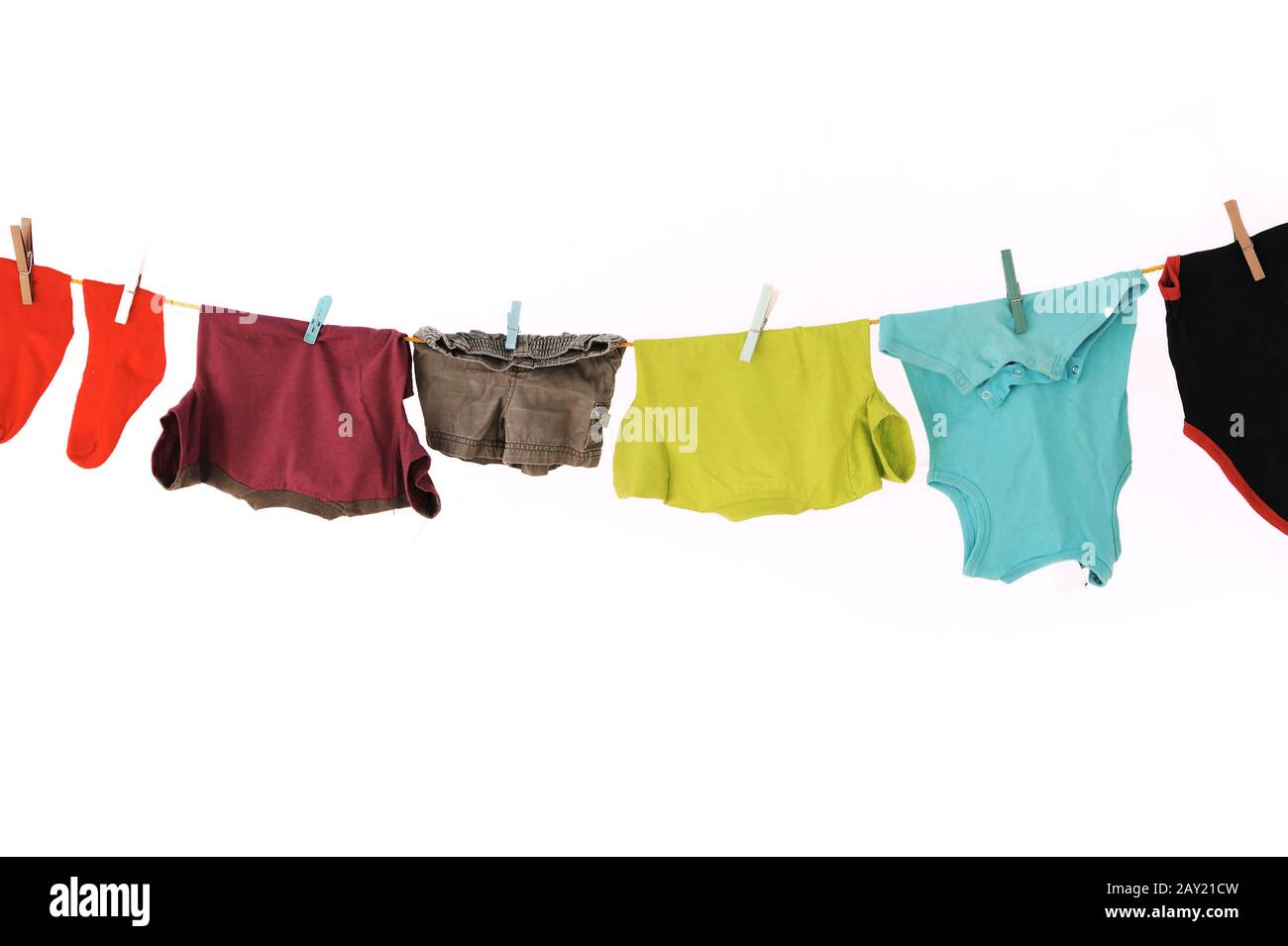 Laundry line with clothes on a white backround Stock Photo - Alamy