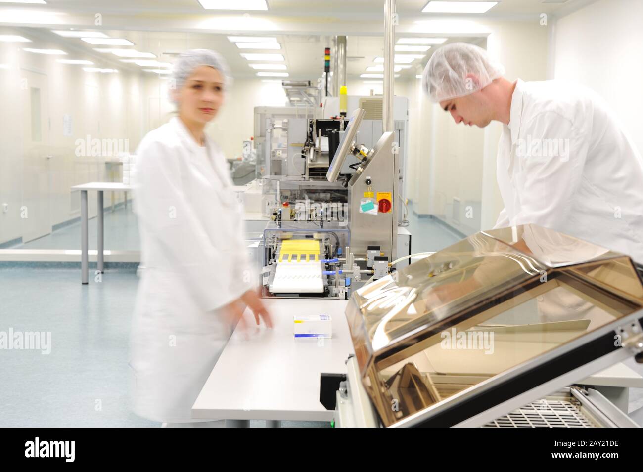 Workers at modern drug factory Stock Photo - Alamy