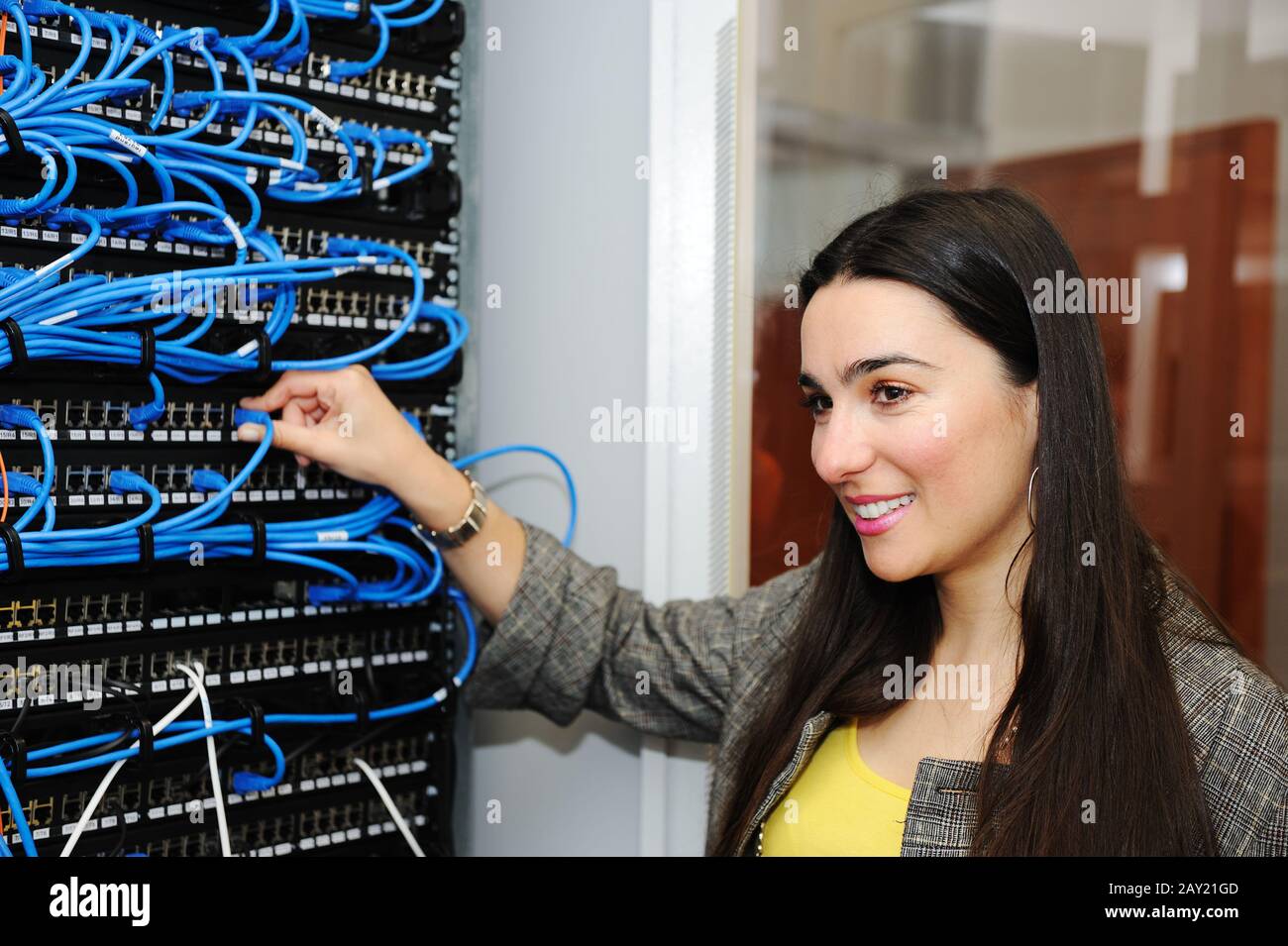 Female administrator at server room Stock Photo - Alamy