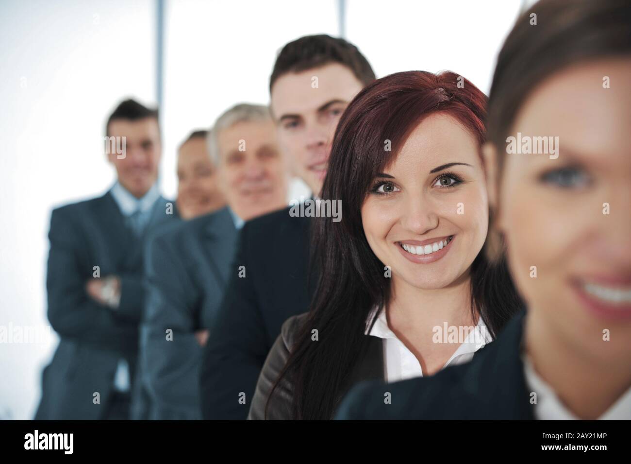 Young people standing together hi-res stock photography and images - Alamy