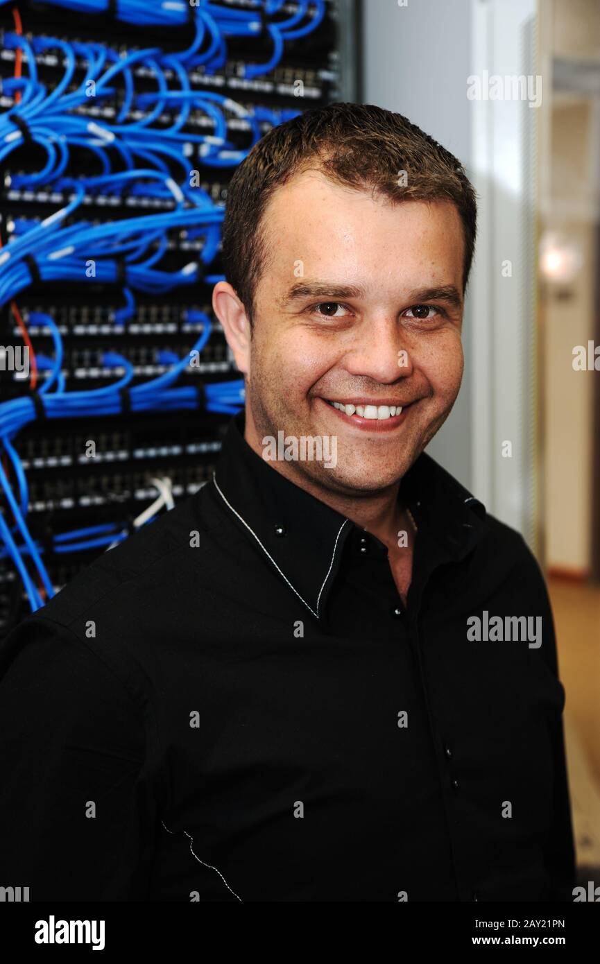 Administrator at server room Stock Photo - Alamy