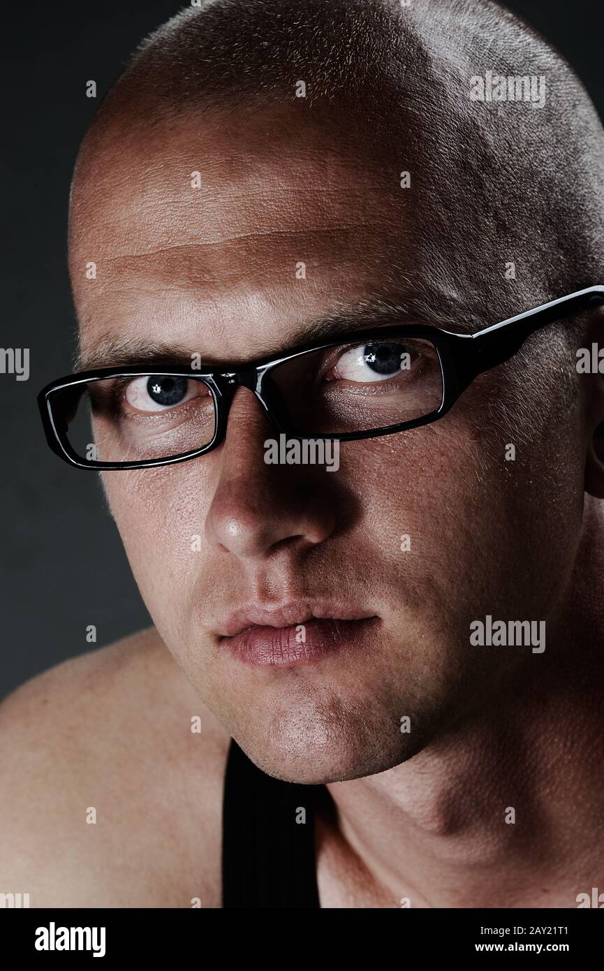 Close up portrait of a man with glasses Stock Photo - Alamy