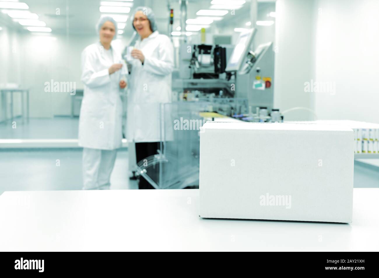 White box at automated production line at modern factory Stock Photo ...