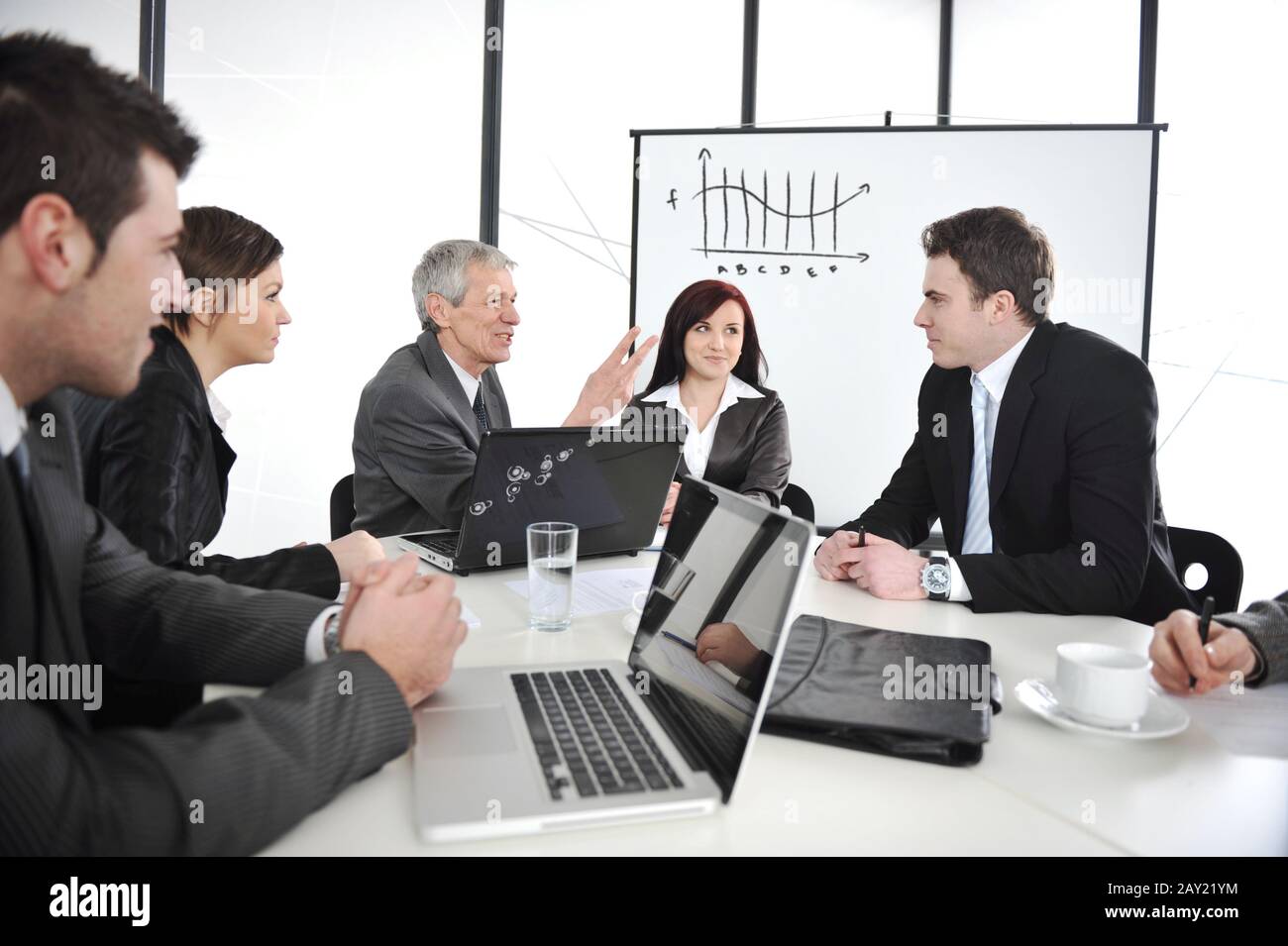 Businesspeople having a business meeting Stock Photo - Alamy
