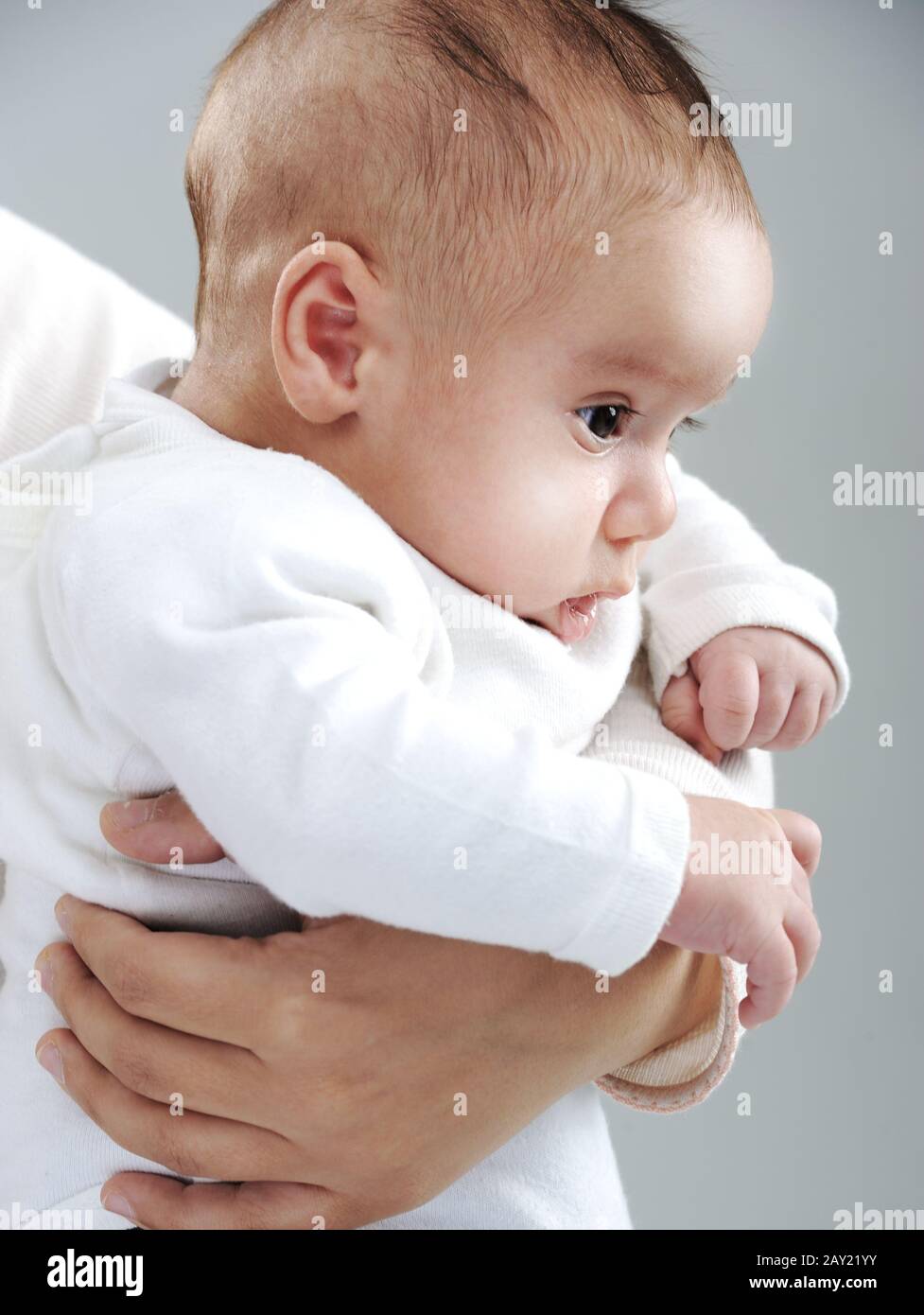 Newborn baby in mother's arms Stock Photo - Alamy