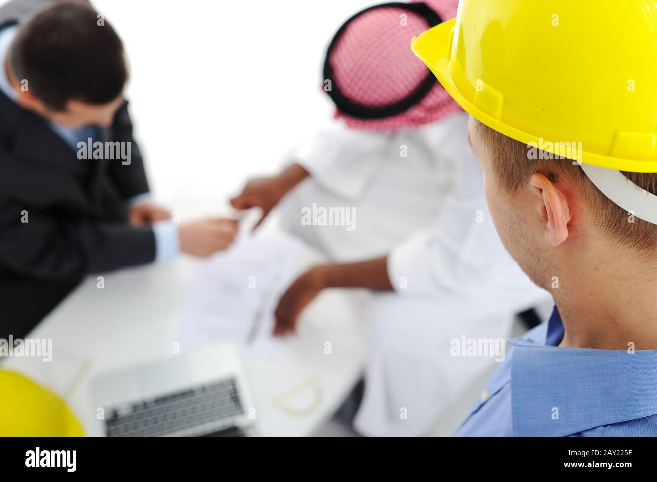 Multicultural group of engineers architects planning for new project ...