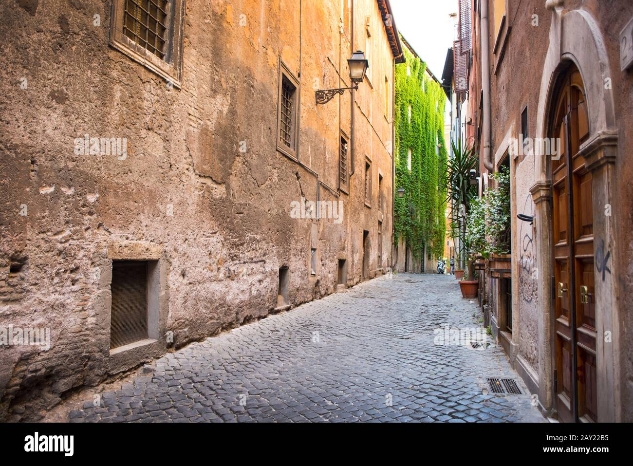 Old alley in the city of Rome Stock Photo - Alamy
