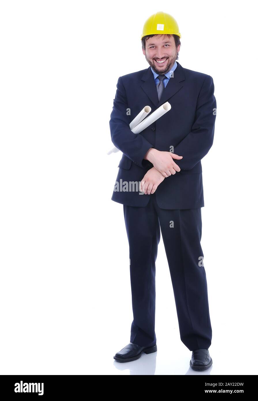 Young caucasian engineer with plans in pose Stock Photo - Alamy