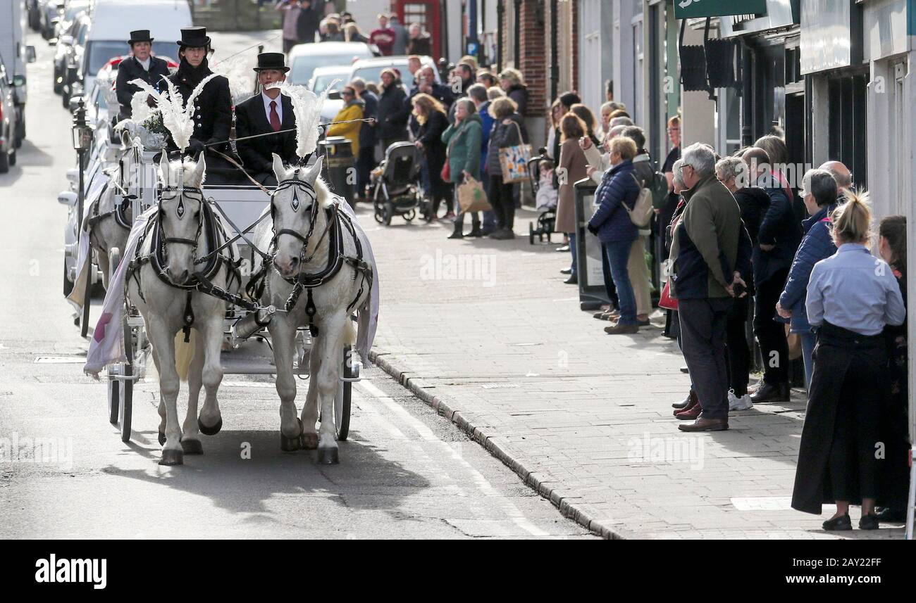 The funeral cortege makes its way to St John the Baptist Church ...