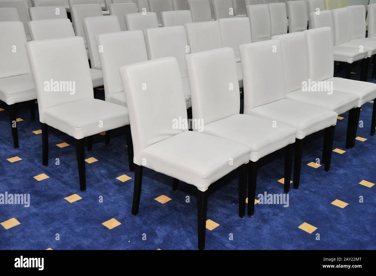 White chairs in conference room Stock Photo - Alamy