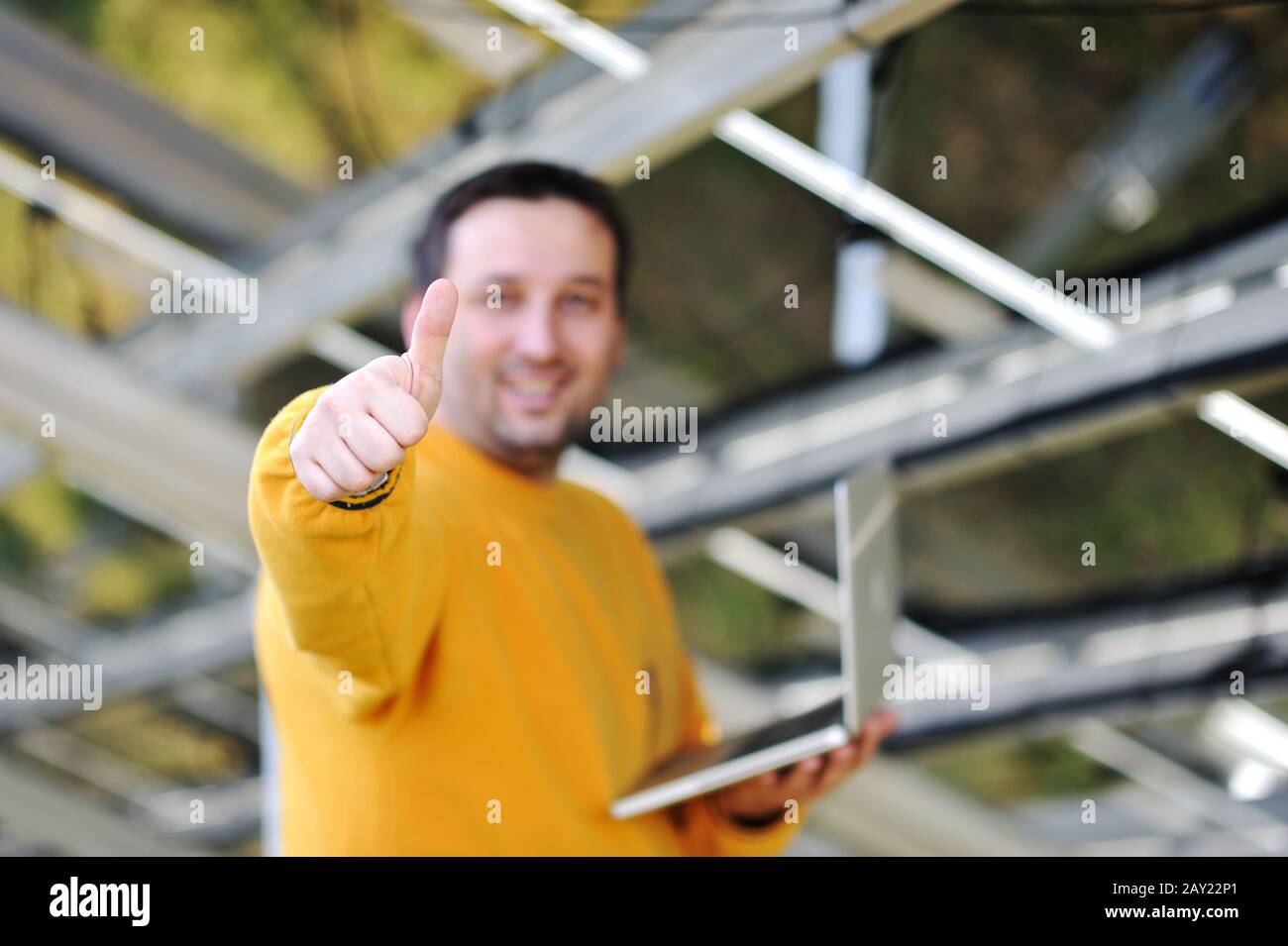 Happy computer engineer thumb up hi-res stock photography and images ...
