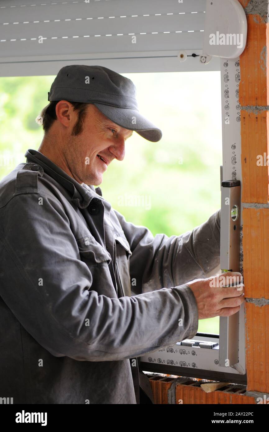 Man using level tool hi-res stock photography and images - Alamy