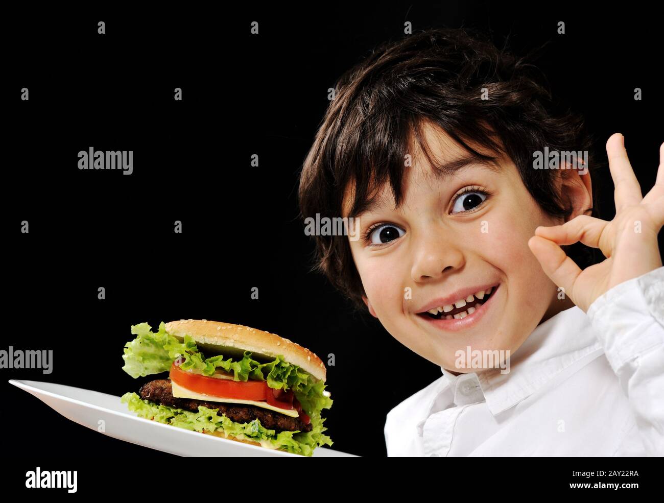 Kid serving burger Stock Photo - Alamy