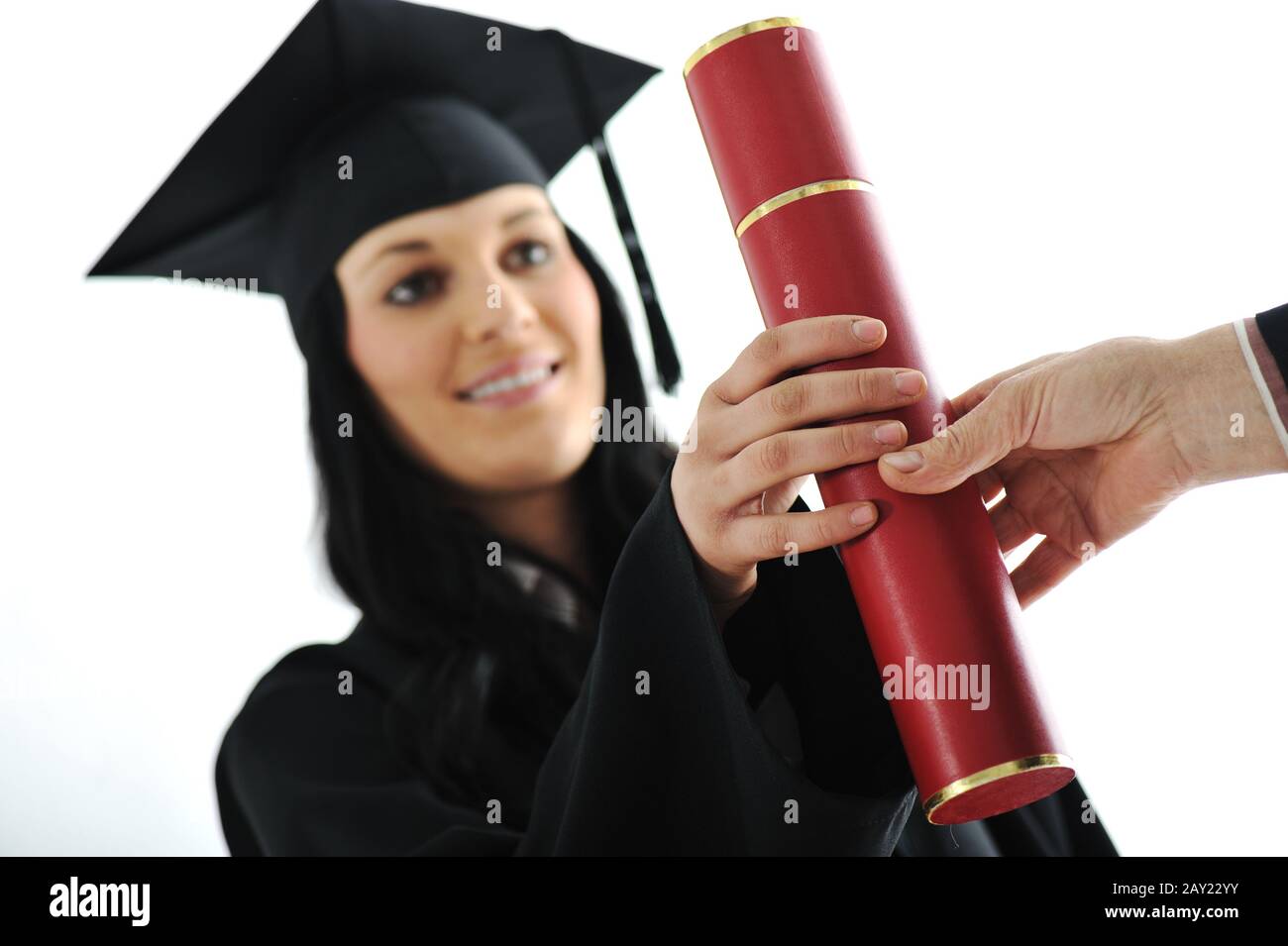 Graduate girl student in gown receiving diploma Stock Photo - Alamy