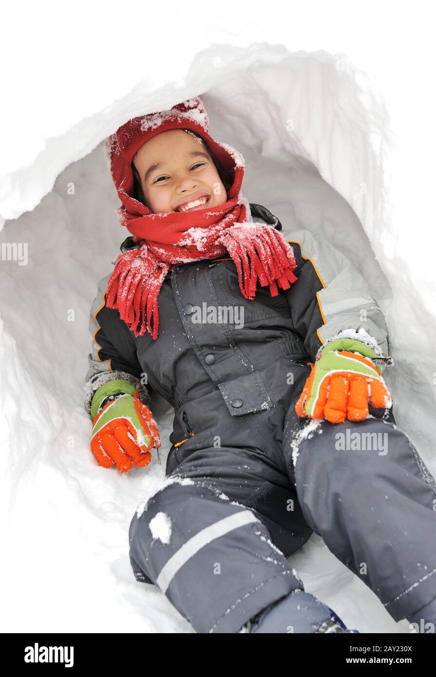Winter fun kid playing having a fun in snow Stock Photo - Alamy