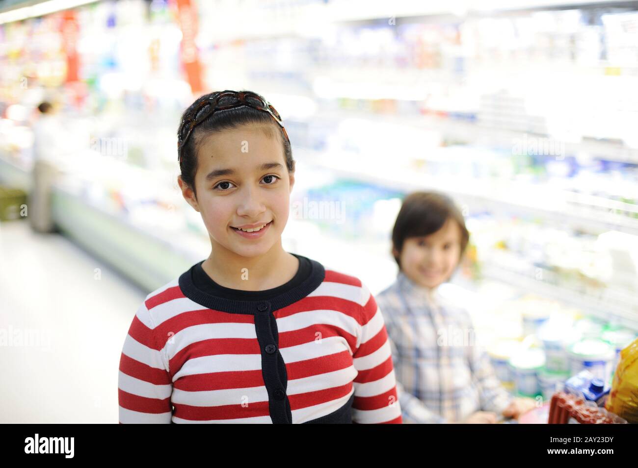 Handsome kids in shopping Stock Photo - Alamy