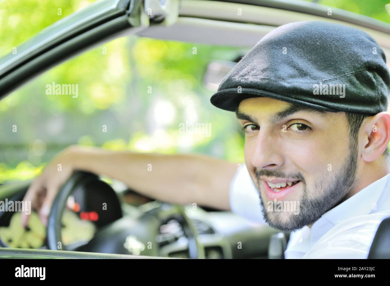Young guy behind the wheel Stock Photo - Alamy