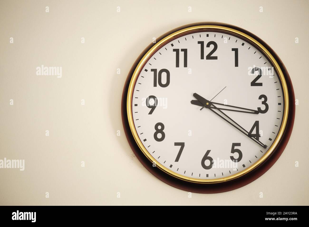 Clock on wall Stock Photo - Alamy