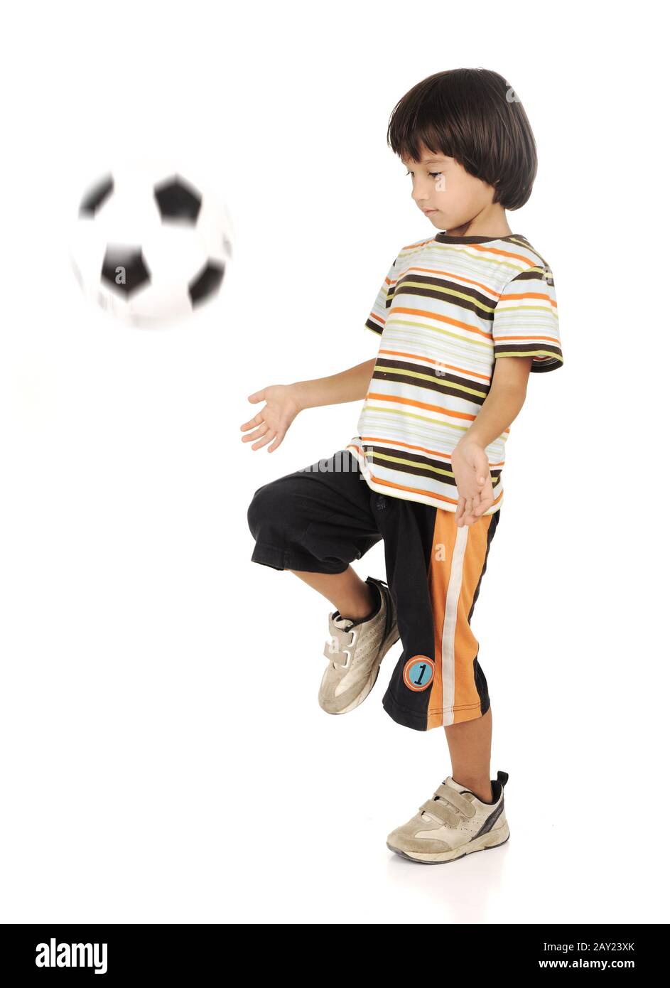 Little boy playing football isolated on white background Stock Photo ...