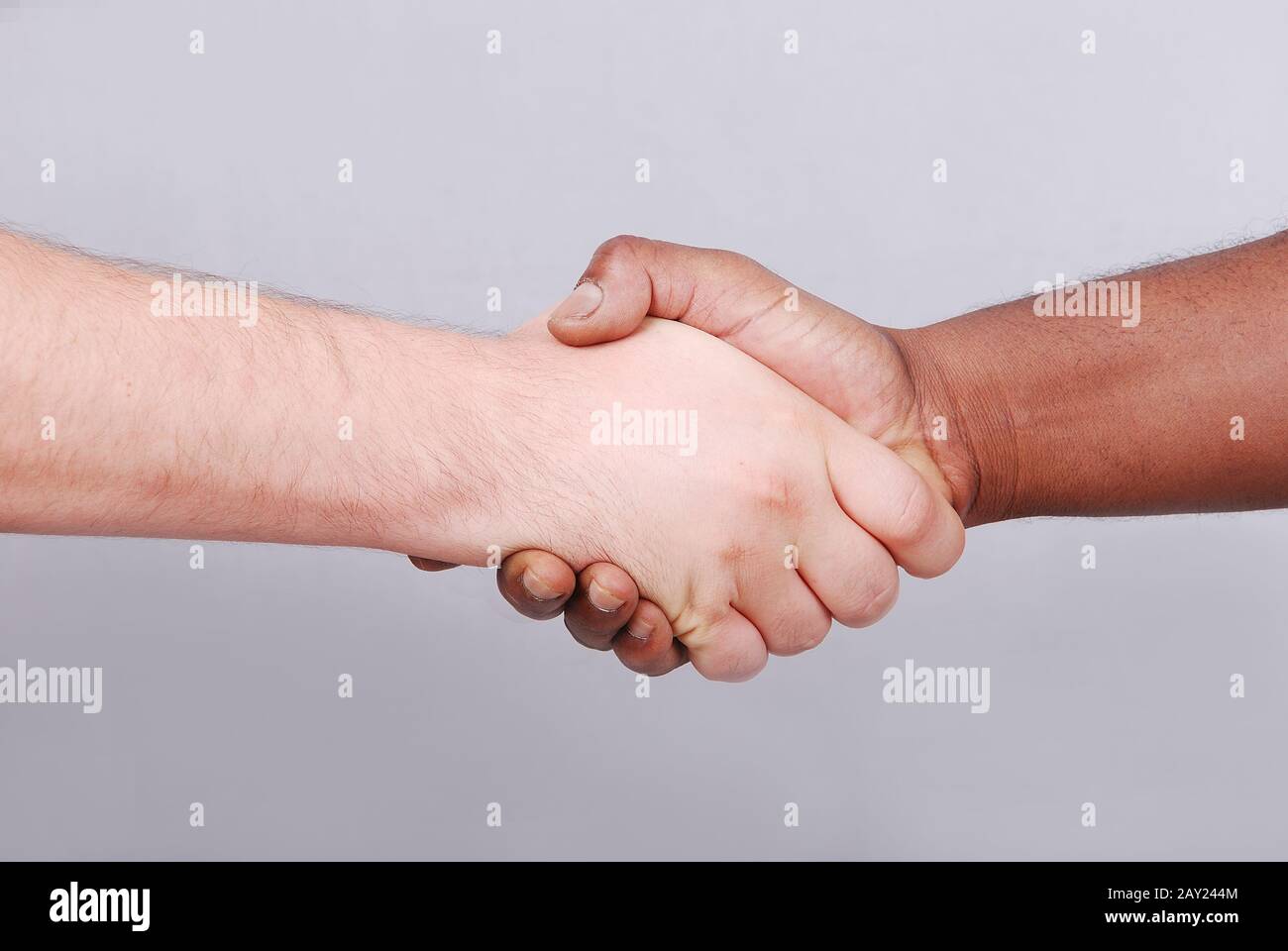 Two hands touching Stock Photo - Alamy