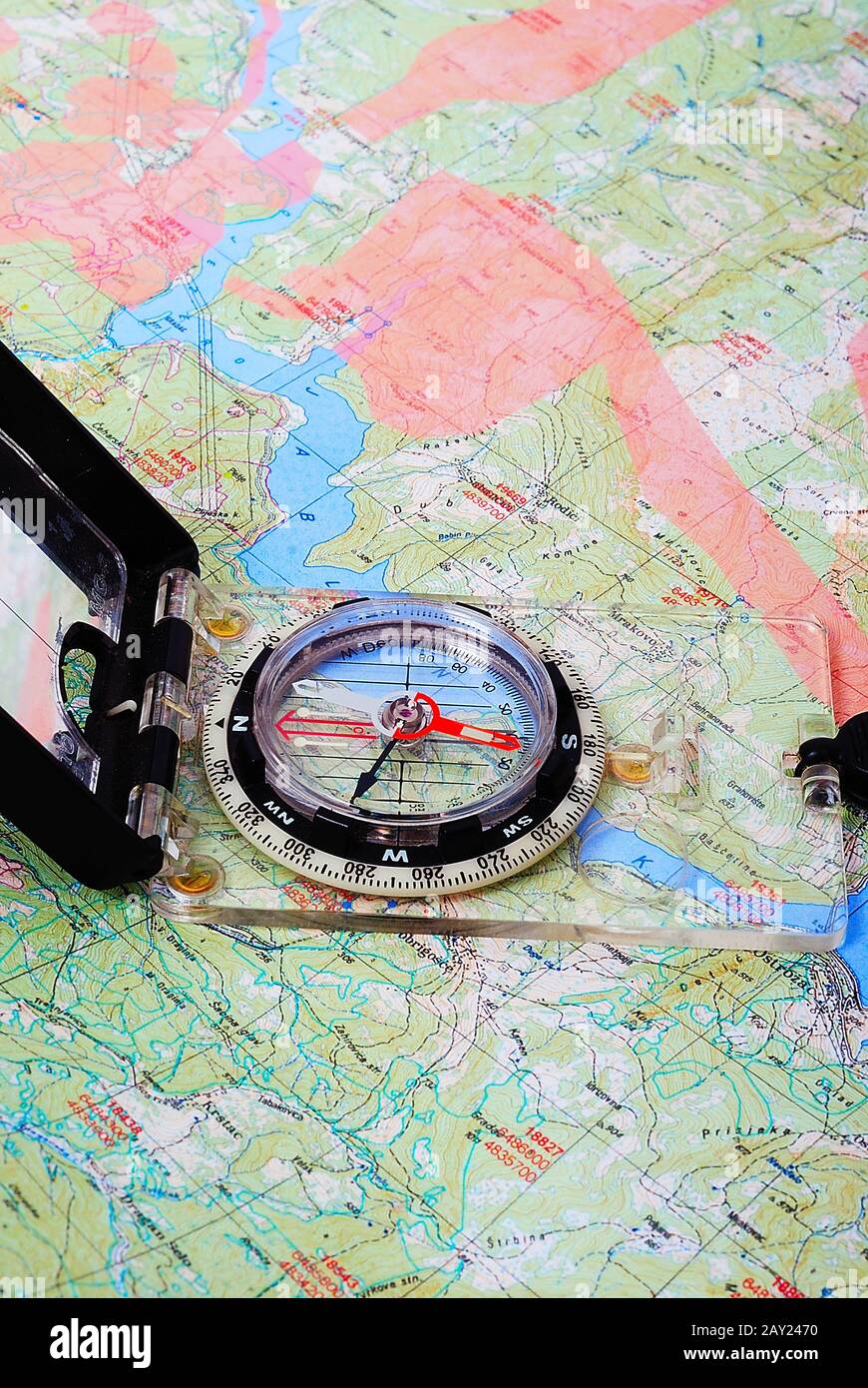 Compass on map Stock Photo - Alamy