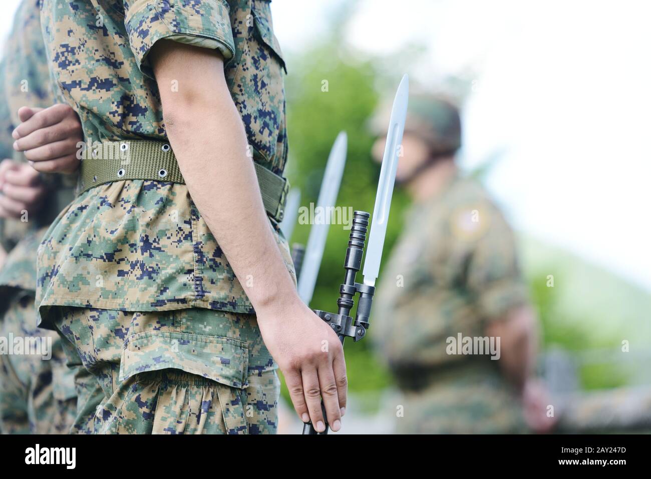 Soldiers with military camouflage uniform in army formation Stock Photo ...