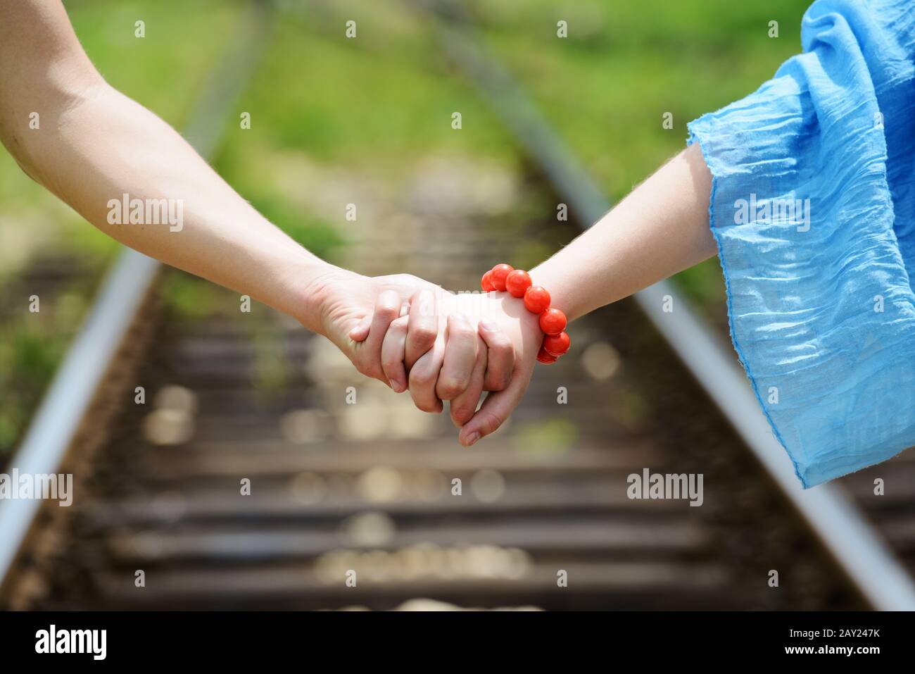 Hands holding rail hi-res stock photography and images - Alamy