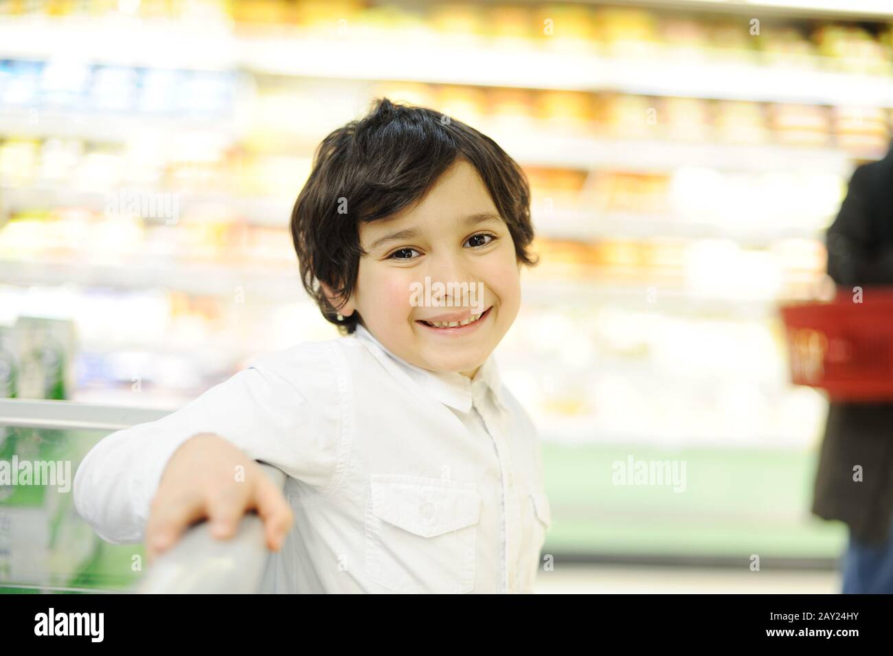 Boy in shop Stock Photo - Alamy