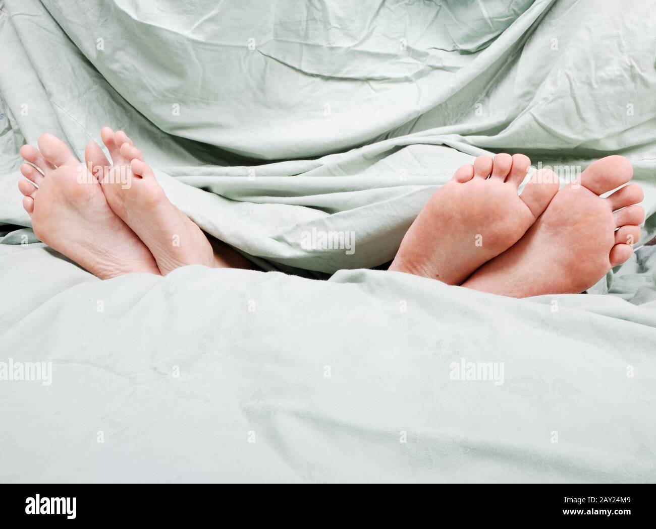 Separation in bed before divorce Stock Photo - Alamy