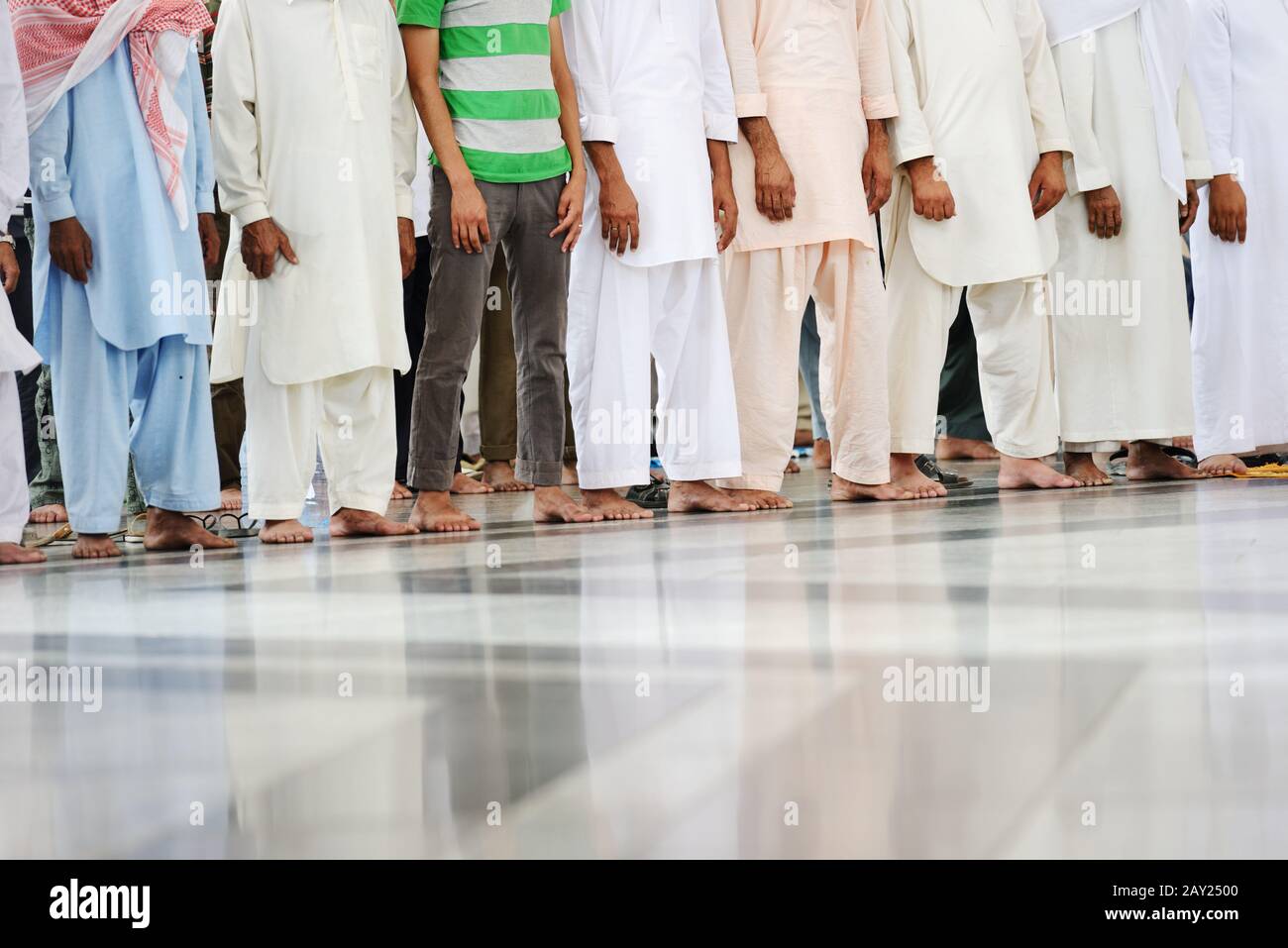Muslims praying together at Holy mosque Stock Photo - Alamy