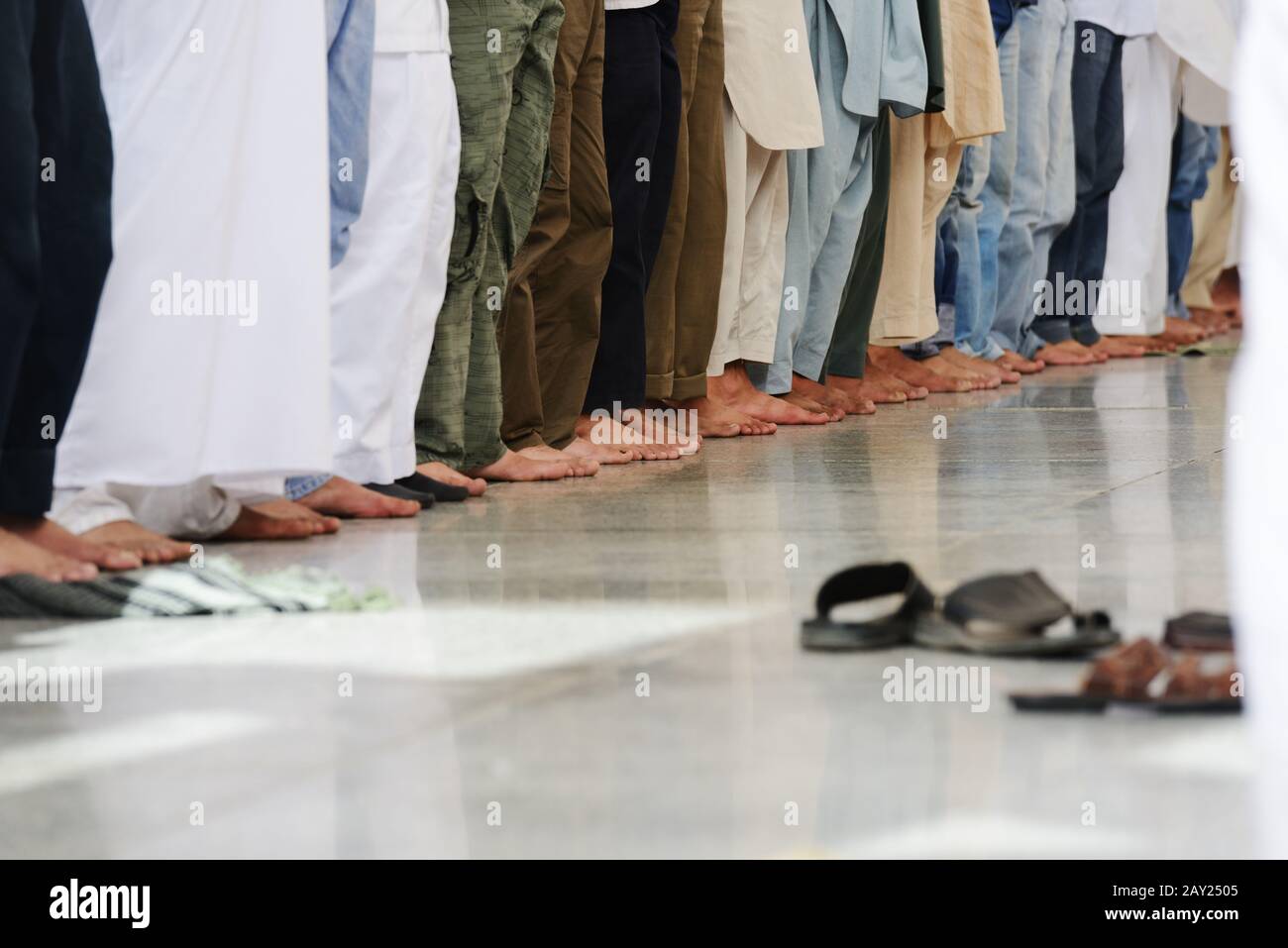 Muslims praying together at Holy mosque Stock Photo - Alamy