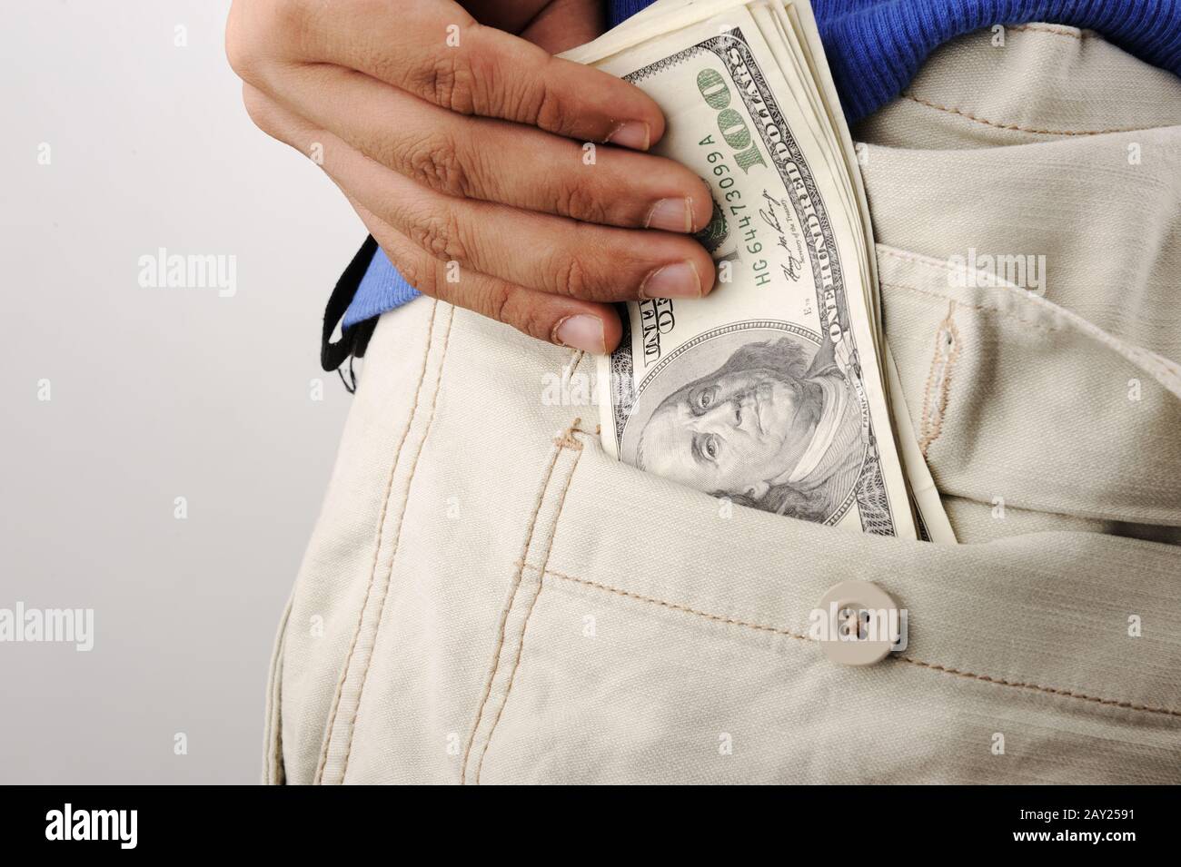 Pocket with money Stock Photo - Alamy