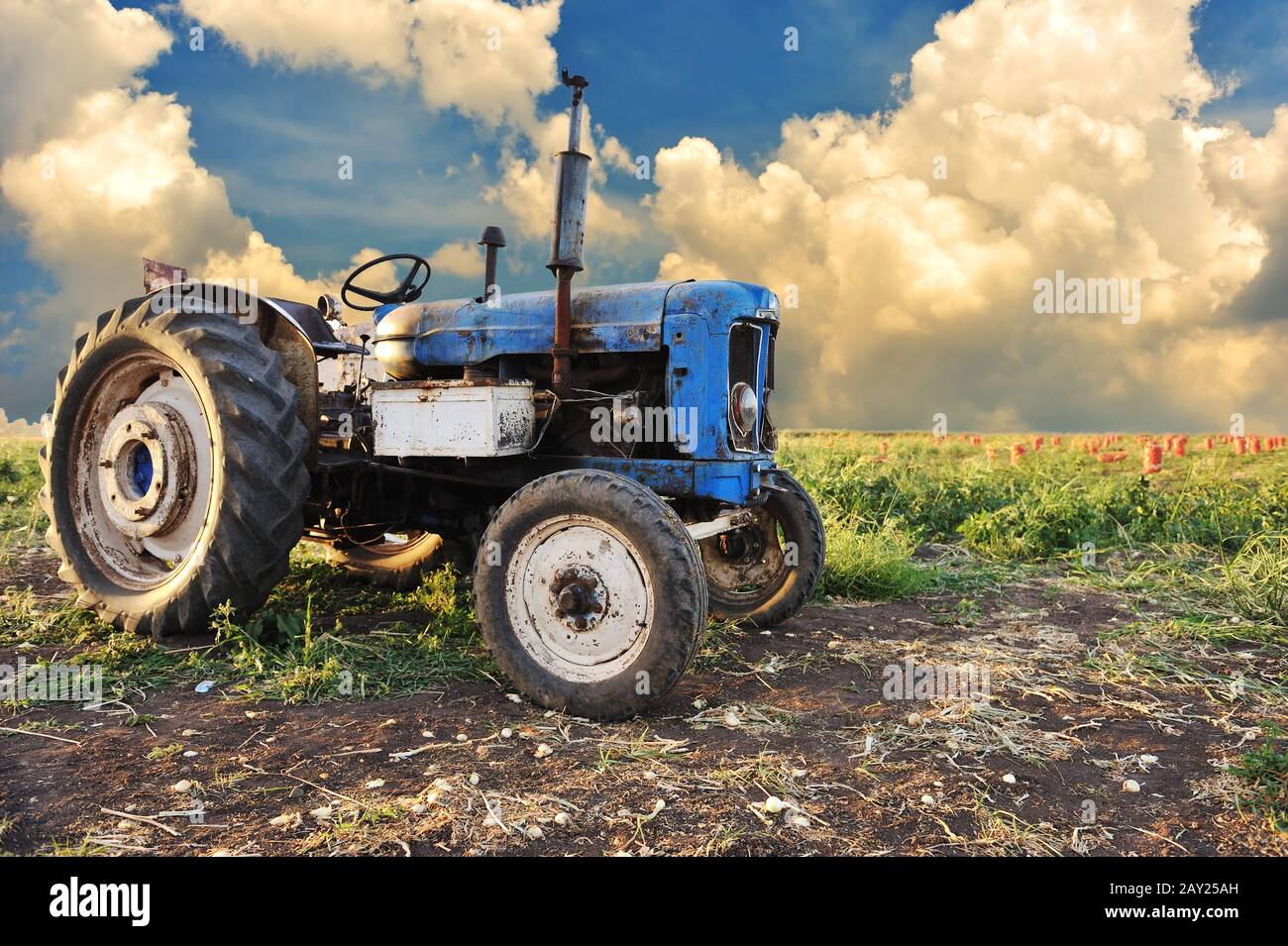 Very old tractor in field, different parts - no trademark at all Stock ...