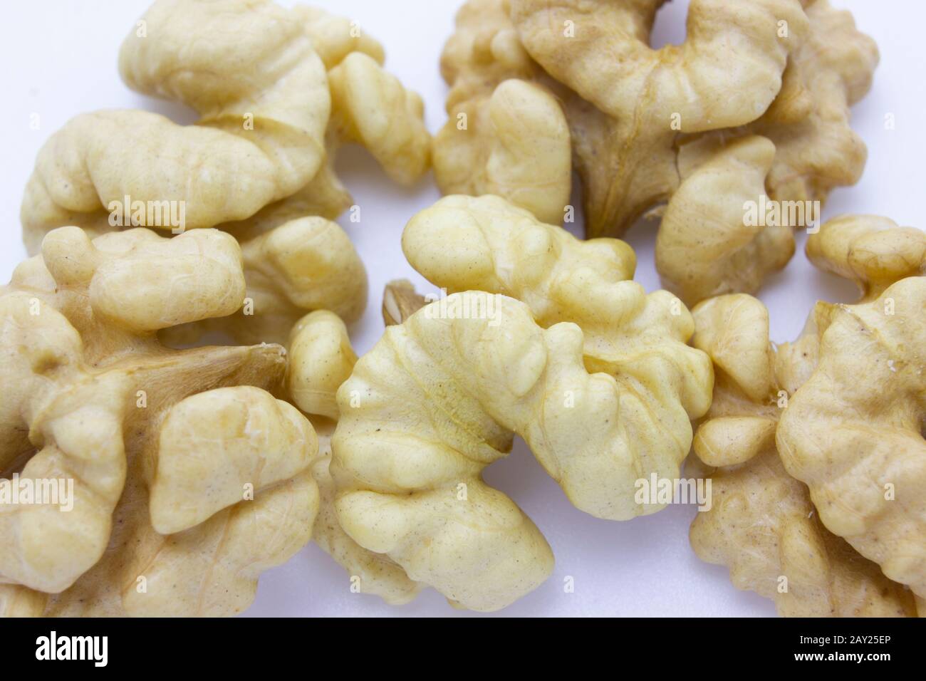 Halves of walnut kernel isolated on white background. Food background ...